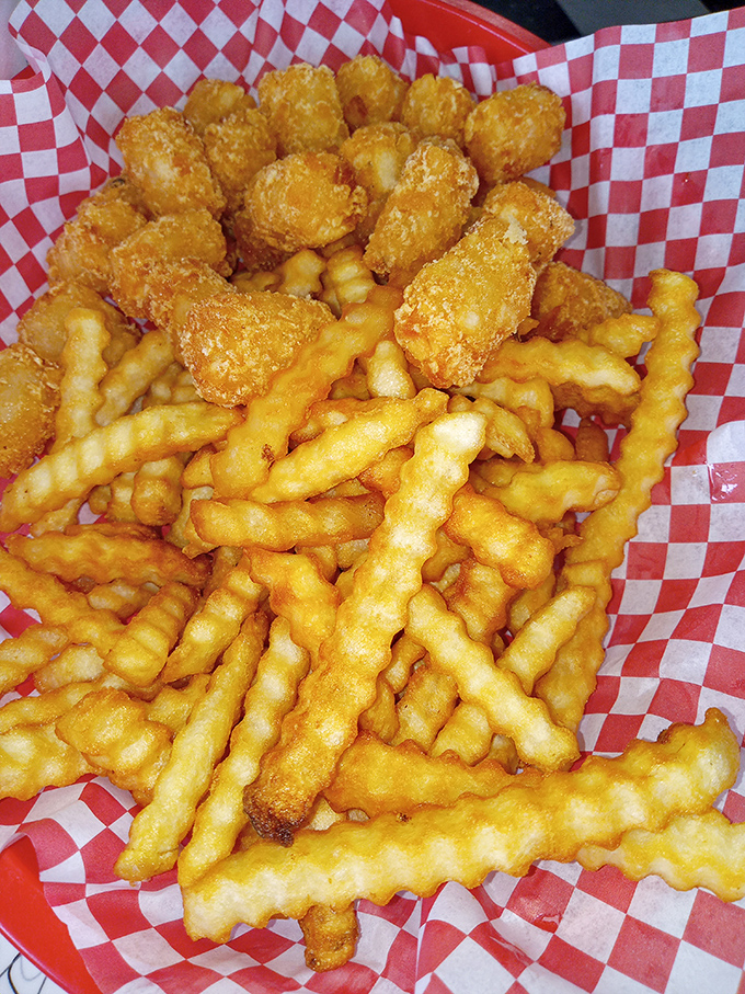 Crinkle-cut fries and cheese balls: the dynamic duo of Midwestern sides. Like Batman and Robin, if they were deep-fried and absolutely delicious.