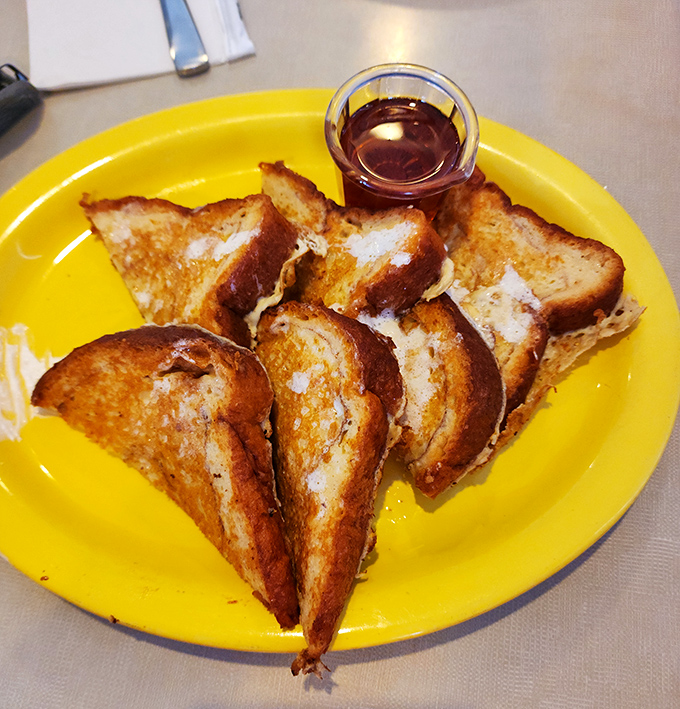 French toast that's achieved the perfect golden-brown tan &ndash; crispy edges giving way to custardy centers that make breakfast feel like dessert.