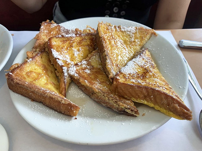 French toast triangles dusted with powdered sugar&mdash;the breakfast equivalent of that perfect song that instantly improves your mood.