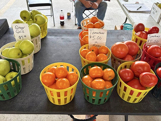 Farm-fresh produce arranged in cheerful baskets&mdash;those tomatoes look like they're still warm from the summer sun.