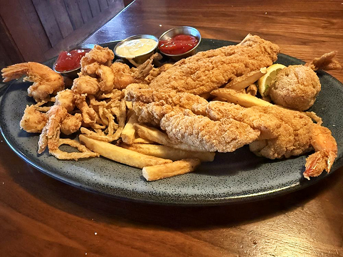 The fried seafood platter that answers the eternal question: "Why choose one when you can have it all?" A golden monument to indecision.