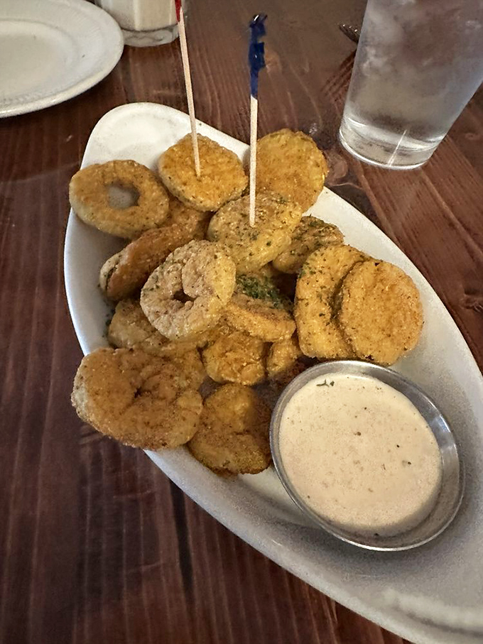 Fried pickle chips that deliver that perfect pucker-crunch combination. Like potato chips but with an attitude adjustment you didn't know you needed.