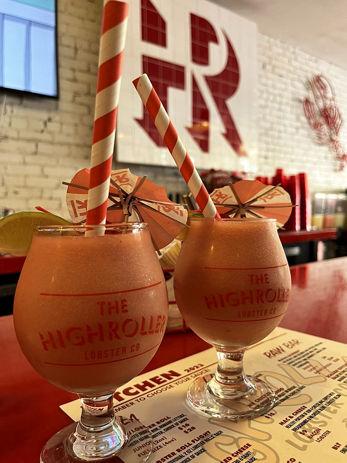 Two frosty cocktails with playful striped straws stand ready for your Instagram moment. Vacation in a glass, Maine style.