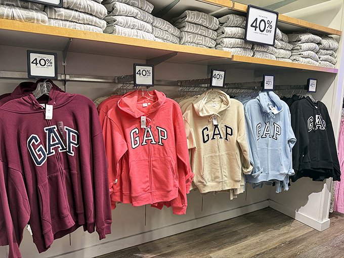 Gap hoodies lined up like a cozy rainbow of comfort. At 40% off, you can justify buying one in every color for Mississippi's three days of winter.