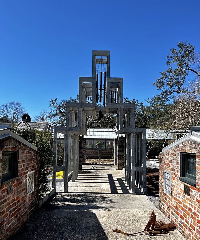 This sculptural garden entrance frames the path ahead like nature's own art installation. The perfect spot for contemplative walks or pretending you're in a period drama.