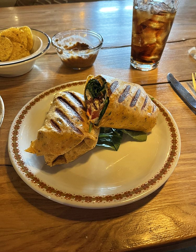 This wrap isn't just a sandwich&mdash;it's architecture. Layers of goodness grilled to perfection and served with a side of British-American diplomacy.