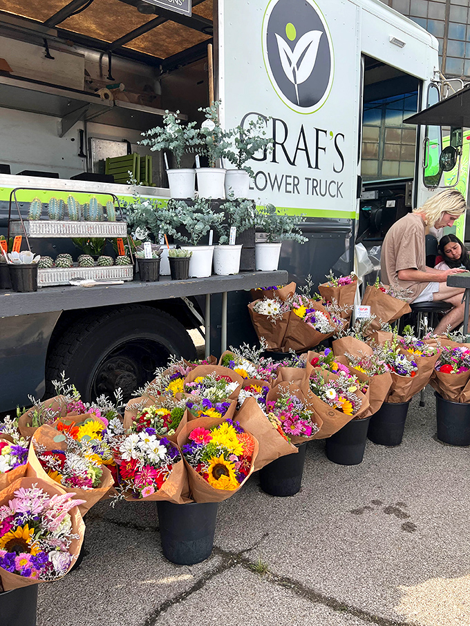 Graf's Flower Truck brings the garden to you with buckets of blooms that transform an industrial setting into an impromptu flower market.