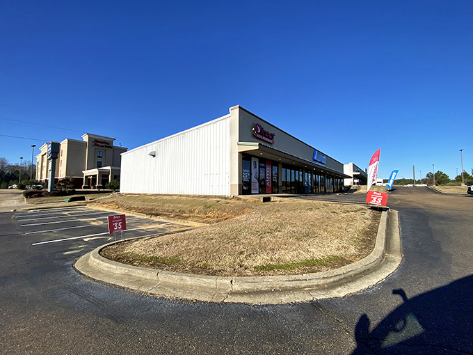 Strip malls in Grenada may lack architectural drama but compensate with practical amenities that keep retirement living convenient and affordable.