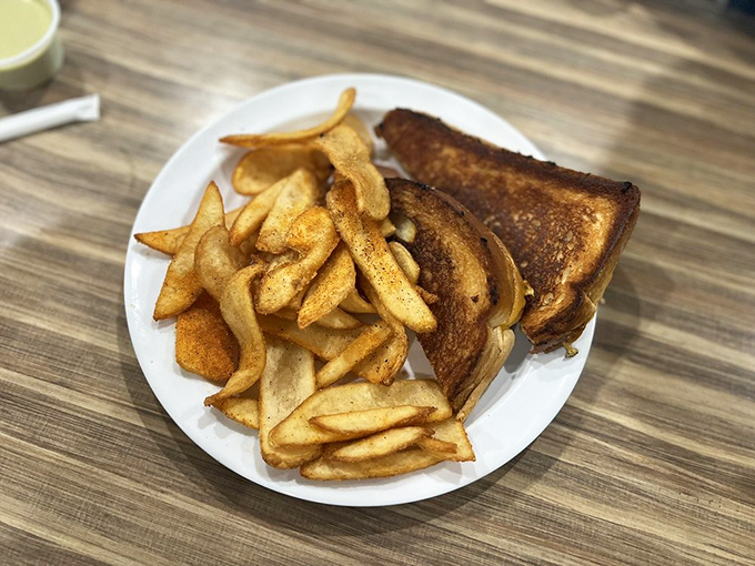 A grilled cheese sandwich with house-made chips that reminds us why sometimes lunch for breakfast is the power move we all need.