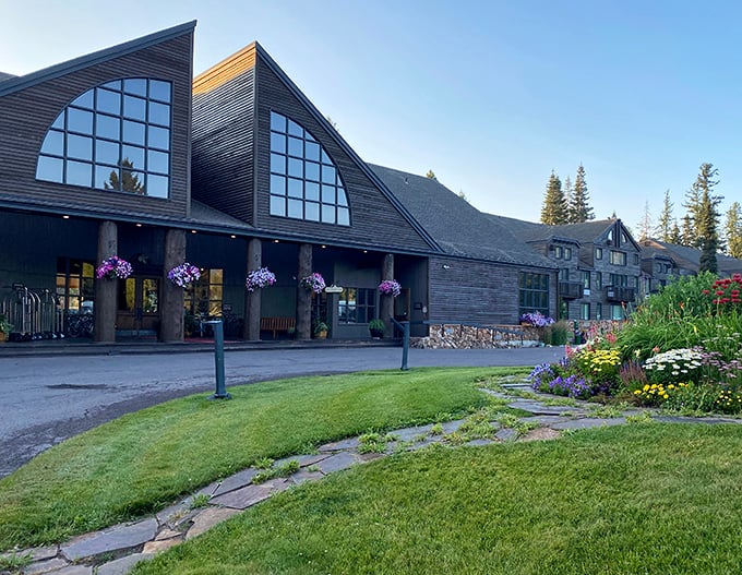 The Grouse Mountain Lodge welcomes visitors with dramatic A-frame windows and hanging flower baskets – Montana's version of the red carpet treatment.
