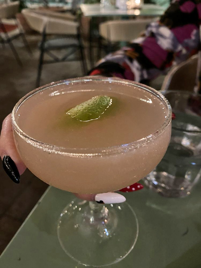 This isn't just a cocktail, it's liquid sunshine. That salt rim and lime wedge are the perfect supporting actors to the star attraction.