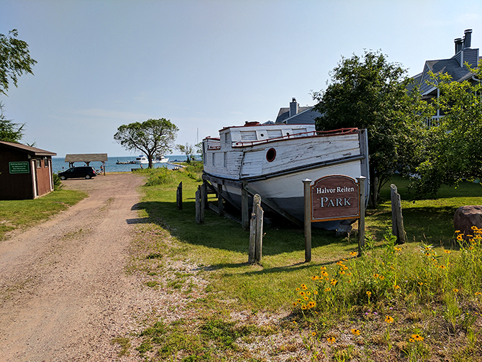 At Halvor Reiten Park, that vintage boat isn't just decoration&mdash;it's a retired local celebrity enjoying its golden years with a lake view.