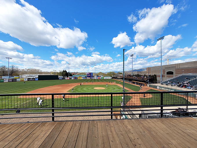 Harris Field's perfect diamond sits under Idaho's impossibly blue skies, offering minor league thrills without major league ticket prices.