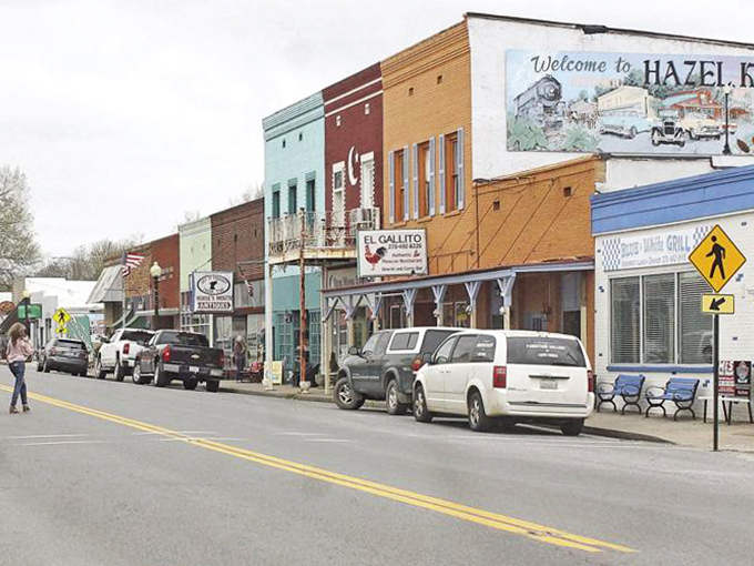 The "Welcome to Hazel" mural doesn't just greet visitors&mdash;it promises an authentic slice of Kentucky life that Amazon can't deliver.