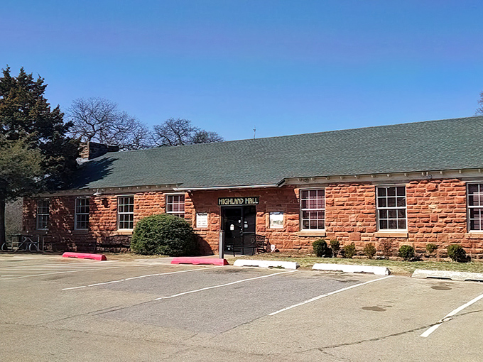 Highland Hall's rustic stone exterior houses community gatherings where strangers quickly become neighbors, and neighbors become friends.