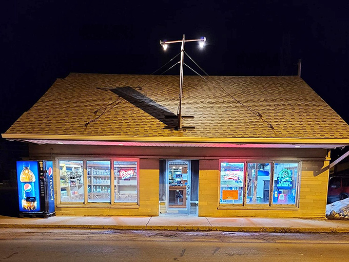 Night falls but Hill Top Liquors glows like a beacon of hospitality, promising liquid remedies for whatever ails you.