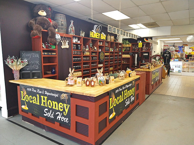 Local honey display so beautifully organized it looks like a boutique hotel for bees decided to open retail.