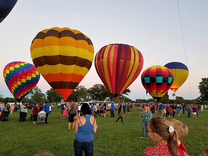 Hot air balloons transform Topeka's skyline into a floating rainbow &ndash; proof that sometimes the best views aren't on your Instagram feed.