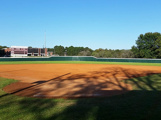 Baseball diamonds are forever, especially in towns where Friday night games become community celebrations. Howard & Mary House Field waits patiently for its next memory-making moment.
