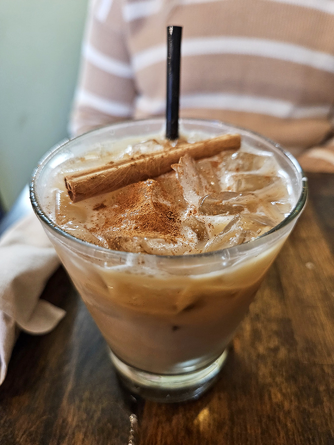 The iced coffee comes with a cinnamon stick&mdash;not just a drink but a cooling system for Columbus summer days when the humidity feels like a warm towel.