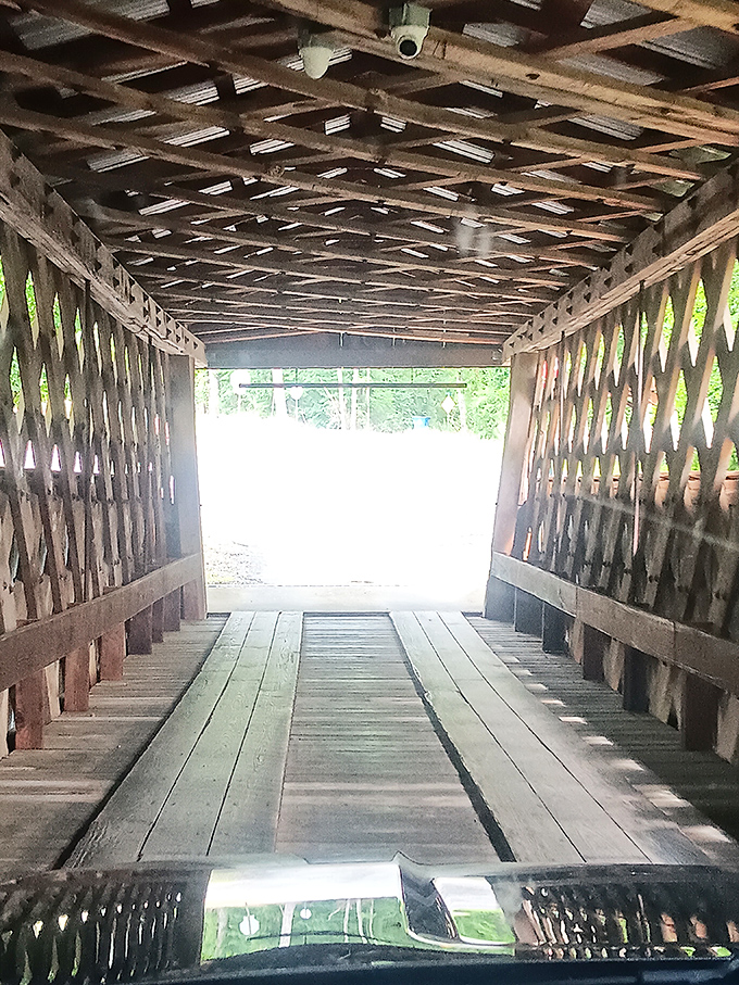 Inside the bridge, sunlight plays between wooden lattice work&mdash;nature's own light show performed on a stage built by human hands.