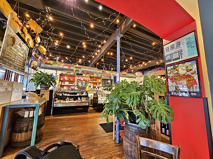 String lights twinkle above the deli counter like stars in a foodie constellation, illuminating a space where sandwich dreams come true.
