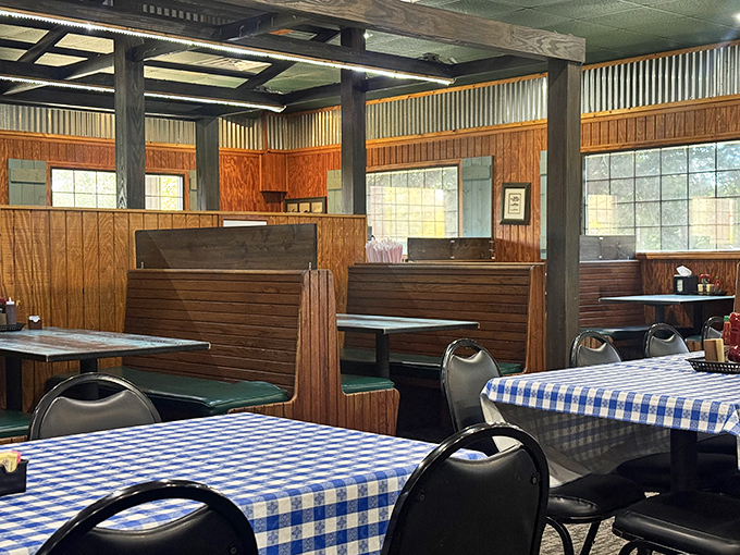 High-backed wooden booths and blue-checkered tablecloths – the universal signal that you're about to enjoy food that's been perfected over generations.