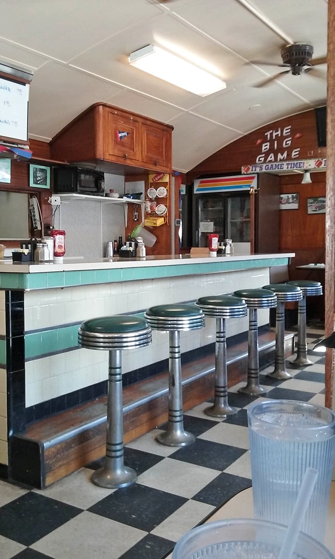 Chrome counter stools await their next storytellers &ndash; these seats have heard more local news than the town newspaper.