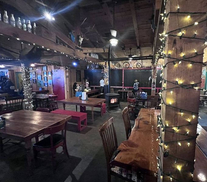 Evening at Mad Jack's transforms the rustic interior into a twinkling barbecue wonderland where meat dreams and mountain magic converge.
