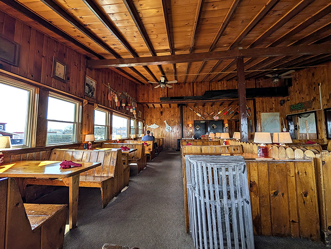 The warm wood interior feels like dining in the world's coziest ship's cabin, where every window frames a postcard-worthy view of Casco Bay.
