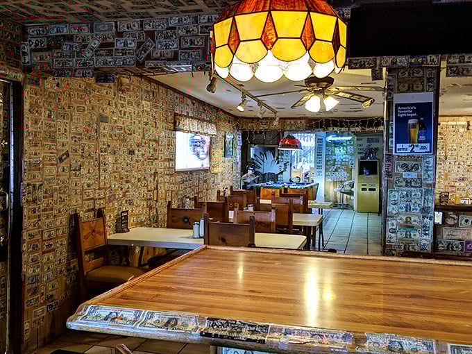 Money talks at the Ski Inn, and it's saying "stay awhile." Vintage lighting casts a warm glow over wooden tables where countless desert travelers have found respite.