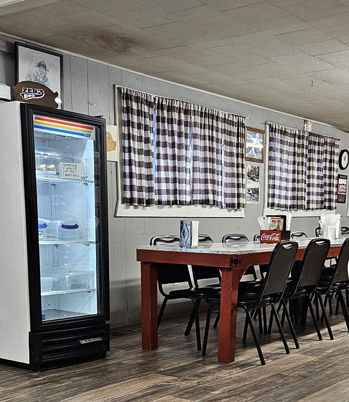 Black and white checkered curtains, simple wooden tables, and a Coca-Cola caddy&mdash;the barbecue equivalent of comfort food for the soul.
