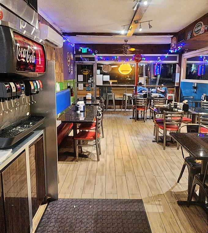The evening glow of neon transforms this humble eatery into a beacon for the burger-obsessed night owls of Deerfield Beach.