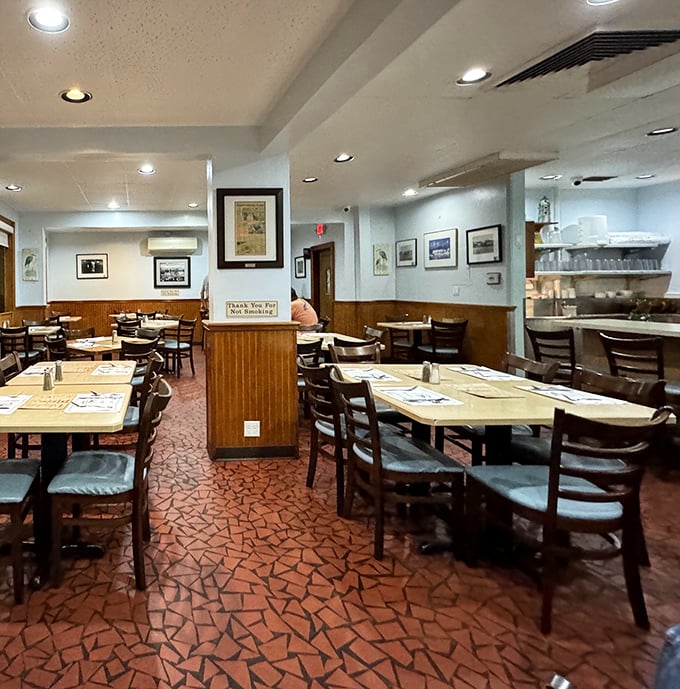 No designer needed to create this authentic atmosphere – just decades of serving exceptional seafood in a space where pretension checked out years ago.