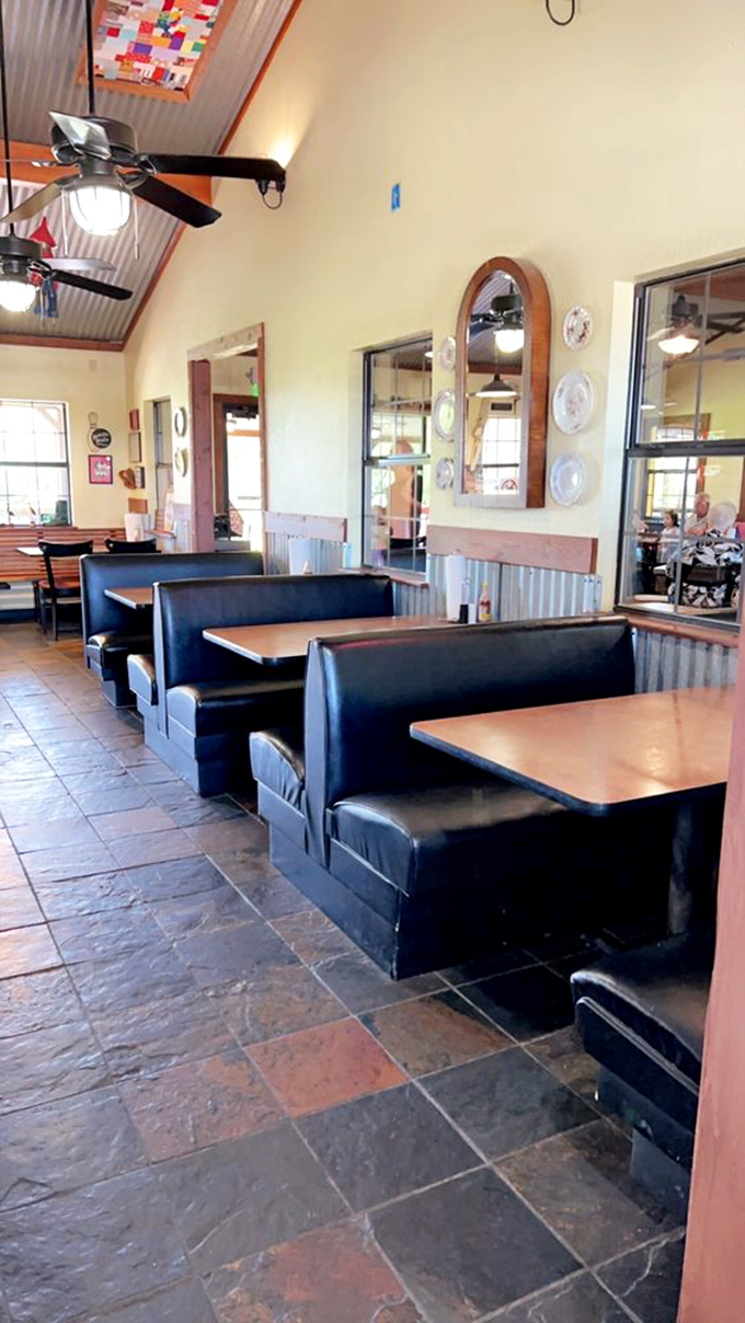Classic diner booths that have cradled countless Texas-sized appetites, with just enough space between tables for privacy but not enough to miss the good gossip.