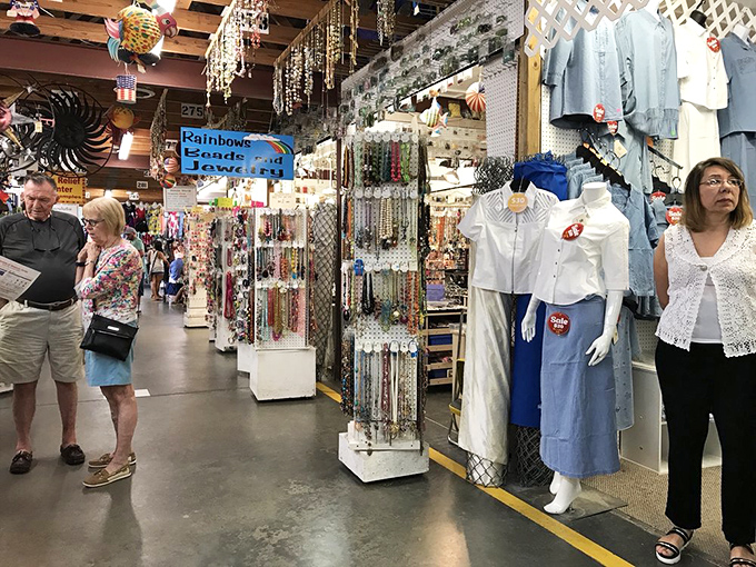 Fashion finds and sparkly treasures line this bustling corridor where shoppers hunt for that perfect accessory to complete their Florida look.