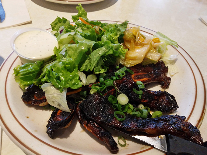 Kalbi ribs so flavorful they make you wonder why you ever bothered with mainland barbecue. The answer is in that char.