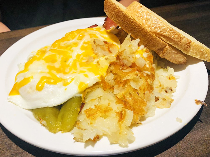 The legendary Buffalo Pie &ndash; where hash browns meet their destiny as the foundation for a mountain of breakfast bliss.