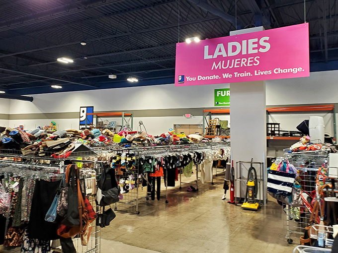 Under the pink "Ladies" sign, a universe of fashion choices awaits, from practical to whimsical and everything between.