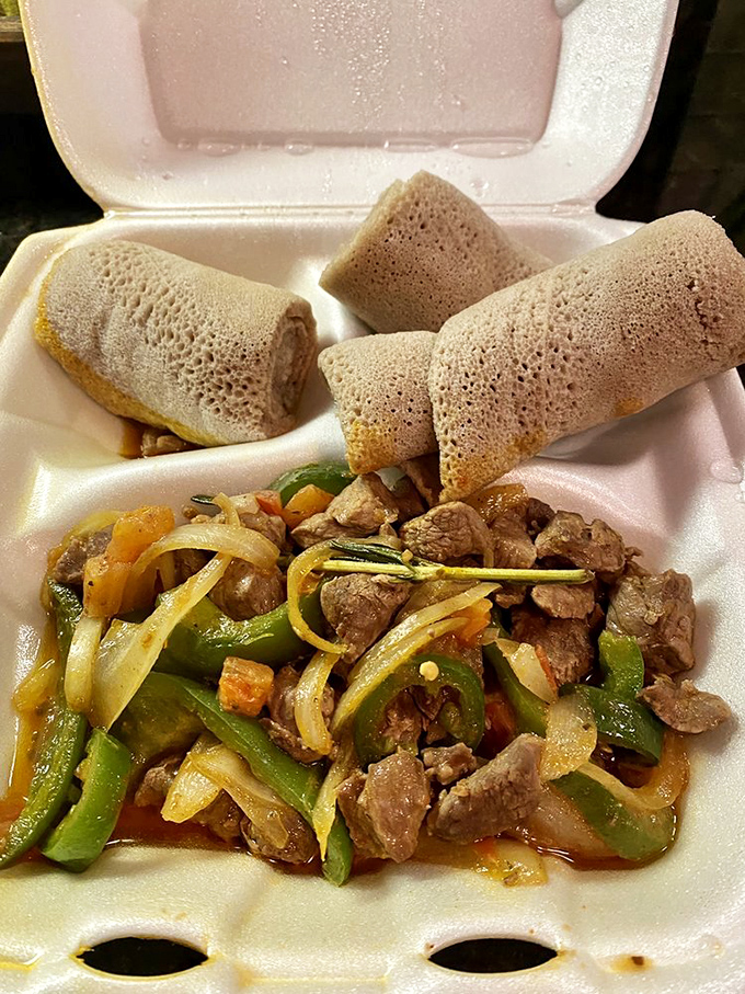 The Lamb Key Wot's rich berbere sauce creates a symphony of spices that would make Mozart put down his baton and pick up a fork.