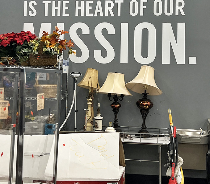 Is the heart of our mission proclaims the wall, while vintage lamps below stand ready to illuminate your reading nook for pennies on the dollar.