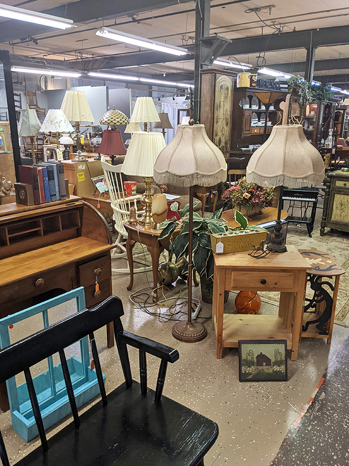 A forest of vintage lamps casts a warm glow over furniture finds. This vignette could be the starting point for your home's next conversation piece.
