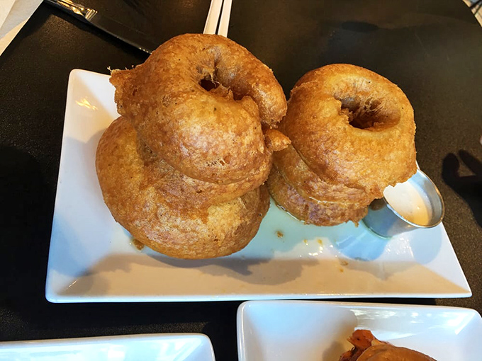 These aren't just onion rings&mdash;they're golden halos of crispy perfection. The kind that make you forget your table manners as you reach for "just one more."