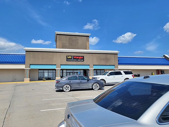 Lee Wrangler: where denim dreams come true under that distinctive blue roof. America's workwear legacy at outlet prices.