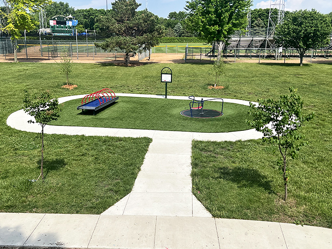 Legion Field's baseball diamond and waterslides coexist peacefully, making summer decisions wonderfully complicated for local families.
