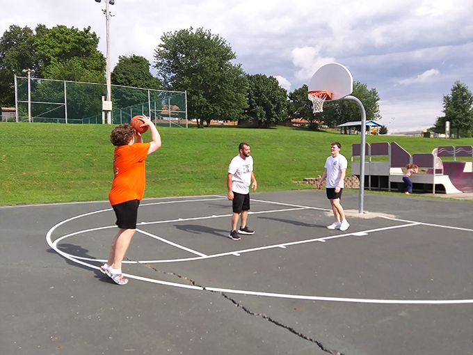 Pickup basketball at the local park—where retirement dreams of NBA stardom never quite die. These courts have witnessed more trash talk than a comedy club.
