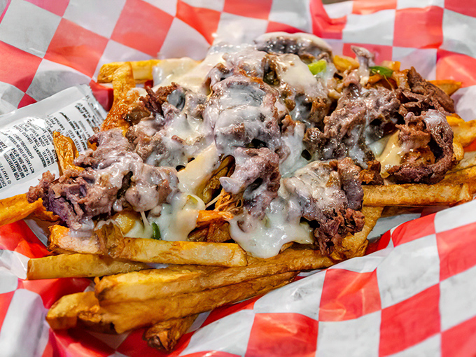 These loaded fries are what happens when potatoes fulfill their highest calling &ndash; smothered in cheese and savory beef, they're a meal disguised as a side.