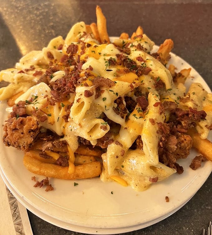 Mac and cheese elevated to an art form with crispy bacon bits. Childhood comfort with grown-up execution.