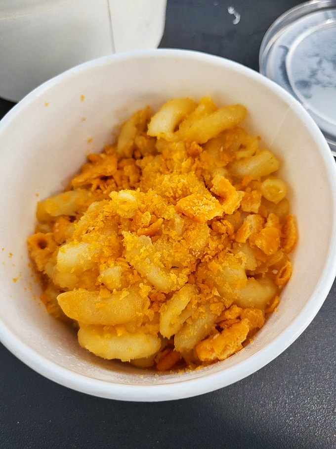 Mac and cheese that would make your childhood self weep with joy. Orange-dusted noodles nestled together like a carbohydrate family reunion.