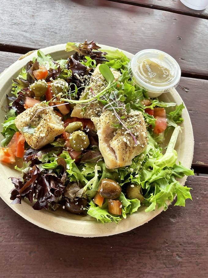 Who says seafood can't be light? This mahi-mahi salad proves fish and greens are a match made in coastal heaven.